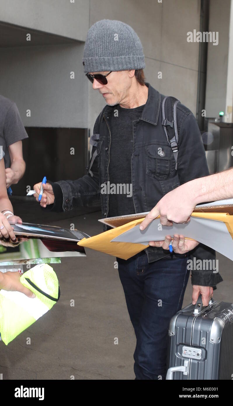 Kevin Bacon signs autographs at Los Angeles International Airport ...