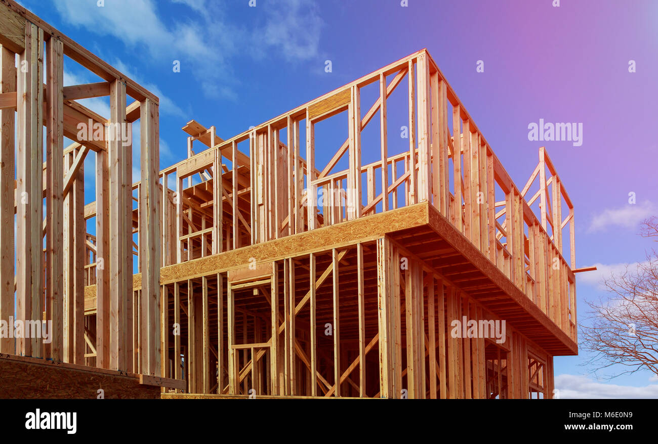A stick built house under construction home framing Stock Photo - Alamy