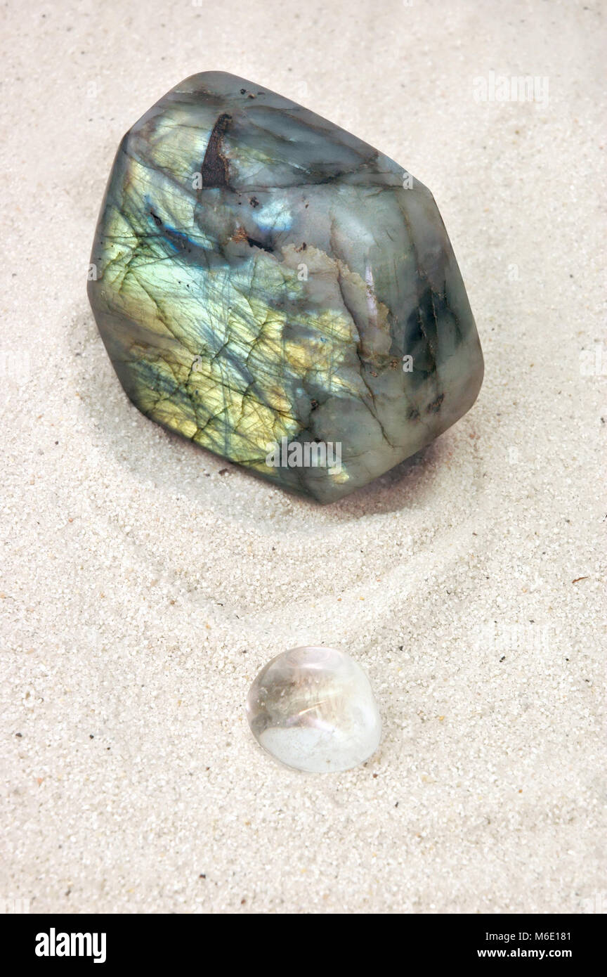 Two different crystals (as kinds) on sand Stock Photo - Alamy