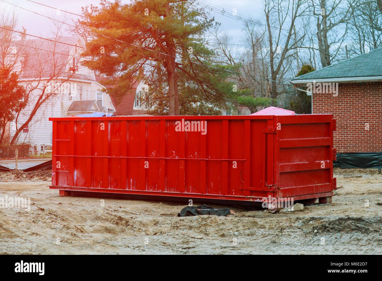 Loaded dumpster near a construction site, home renovation container for ...