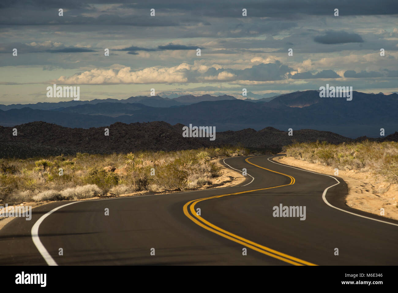 Winding Road Through Desert Stock Photo - Alamy