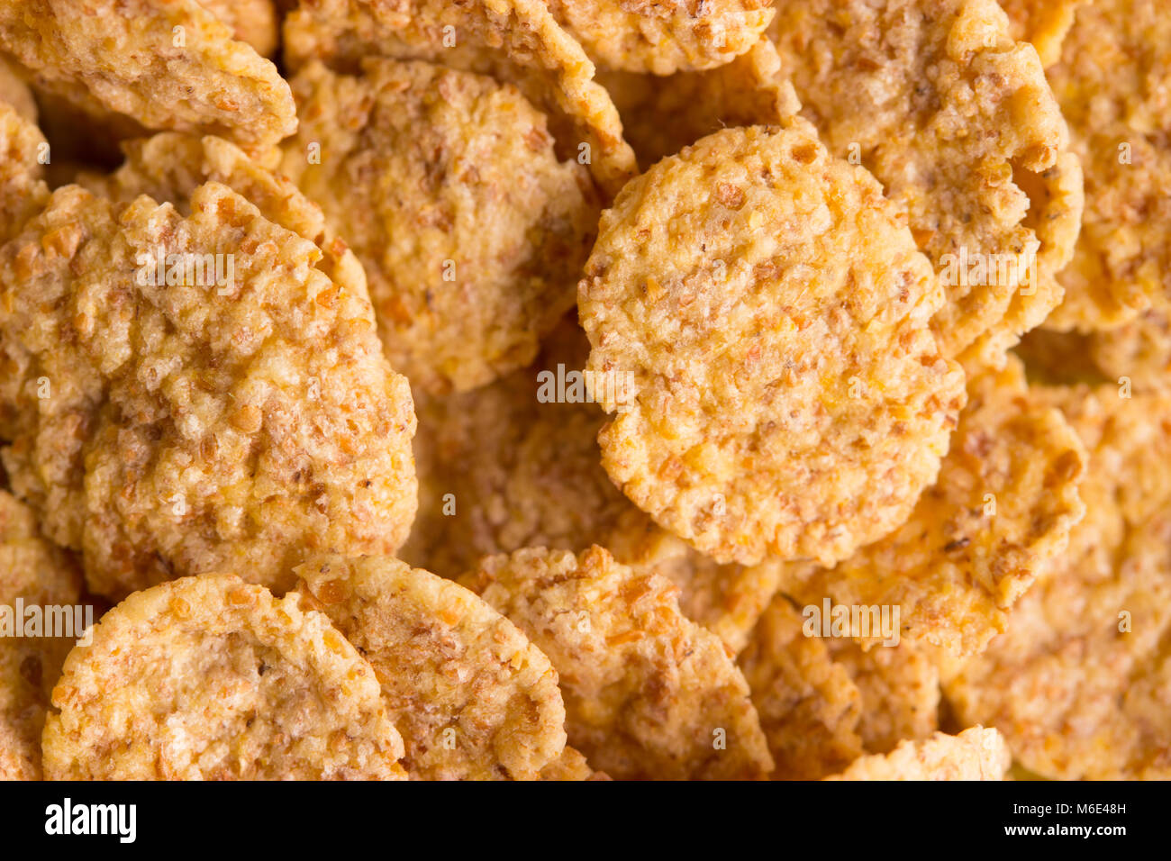 cornflakes background close up. yellow cereals background Stock Photo ...