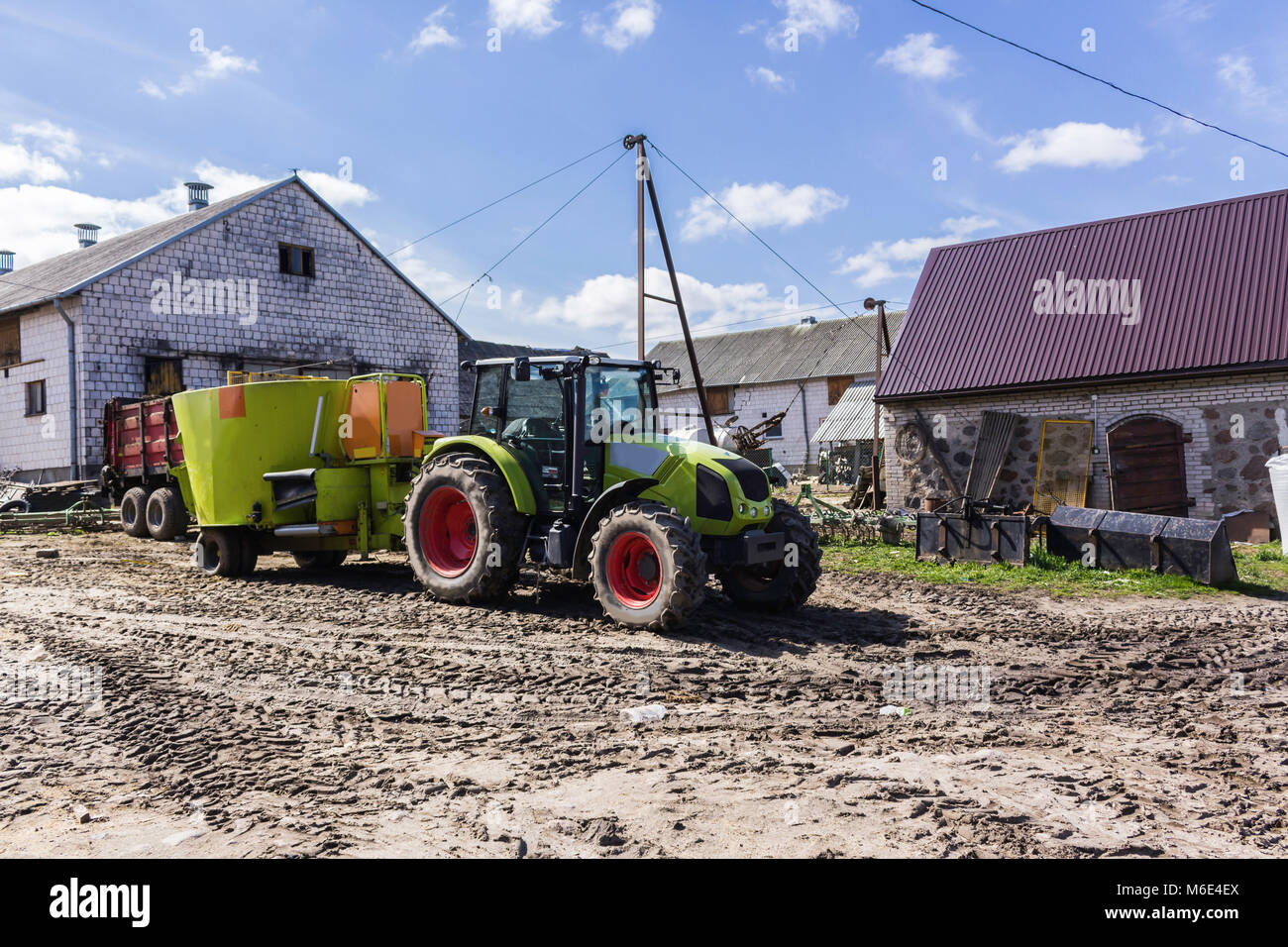 Agricultural machinery and equipment . The tractor with distributor of ...