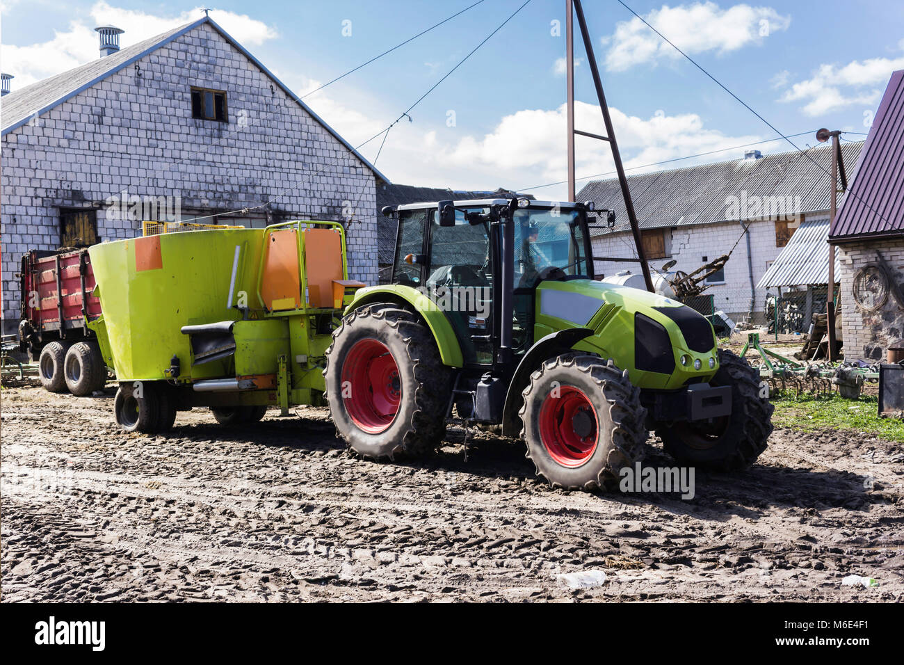 Agricultural machinery and equipment . The tractor with distributor of ...