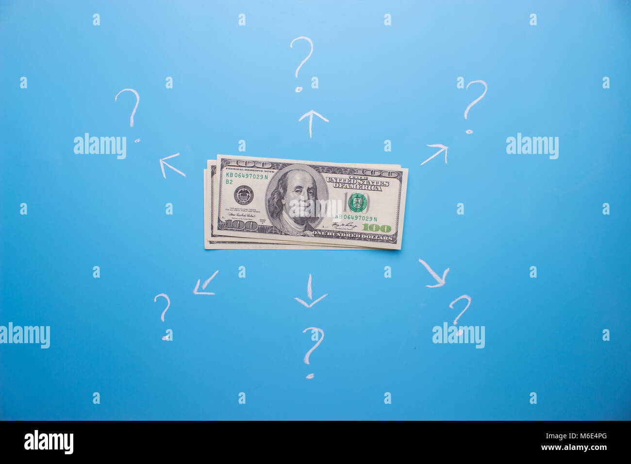 money with arrow and question mark. on what to spend money concept ...
