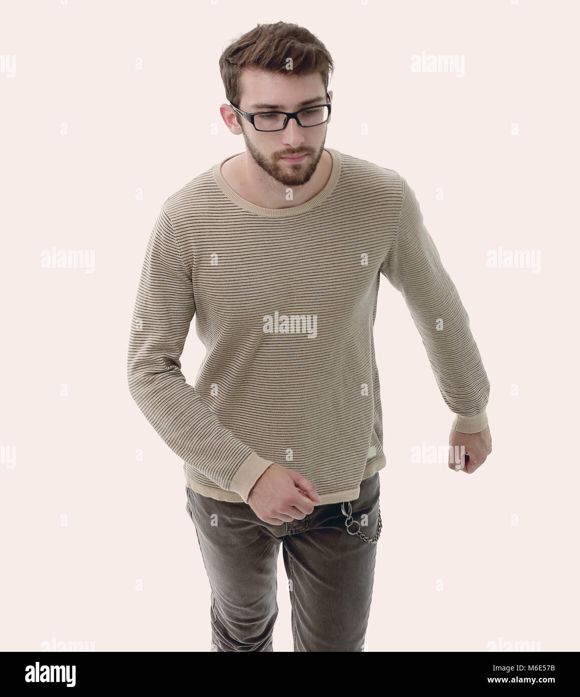 modern young man confidently goes forward Stock Photo - Alamy