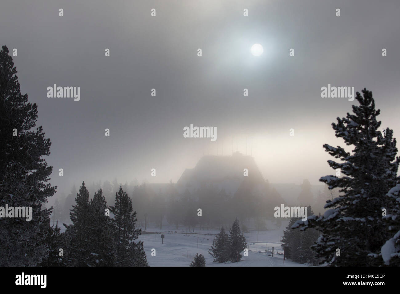 The Old Faithful Inn, shrouded in geyser fog Stock Photo - Alamy