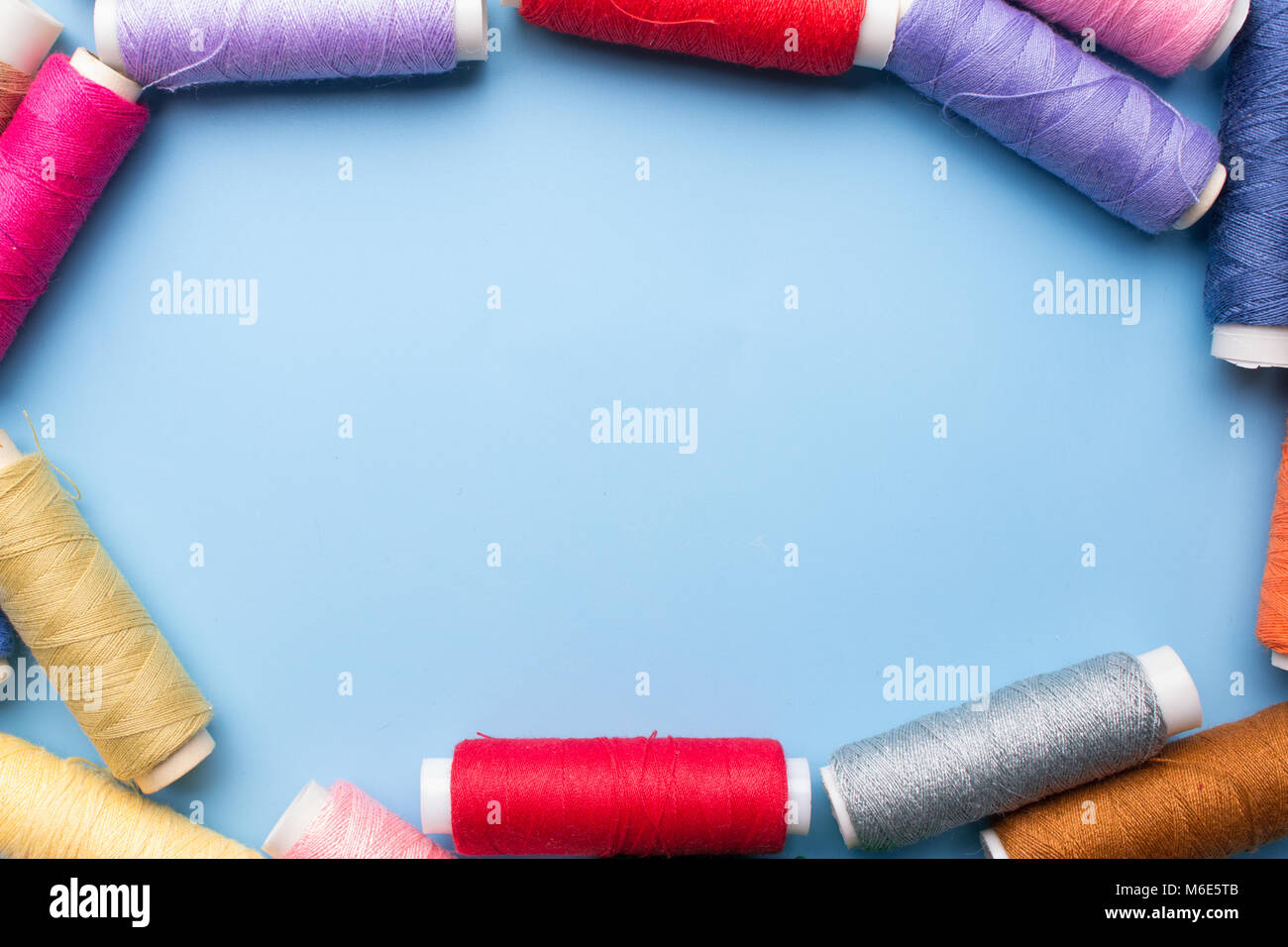 spools of thread for sewing, background with copy space for text or ...