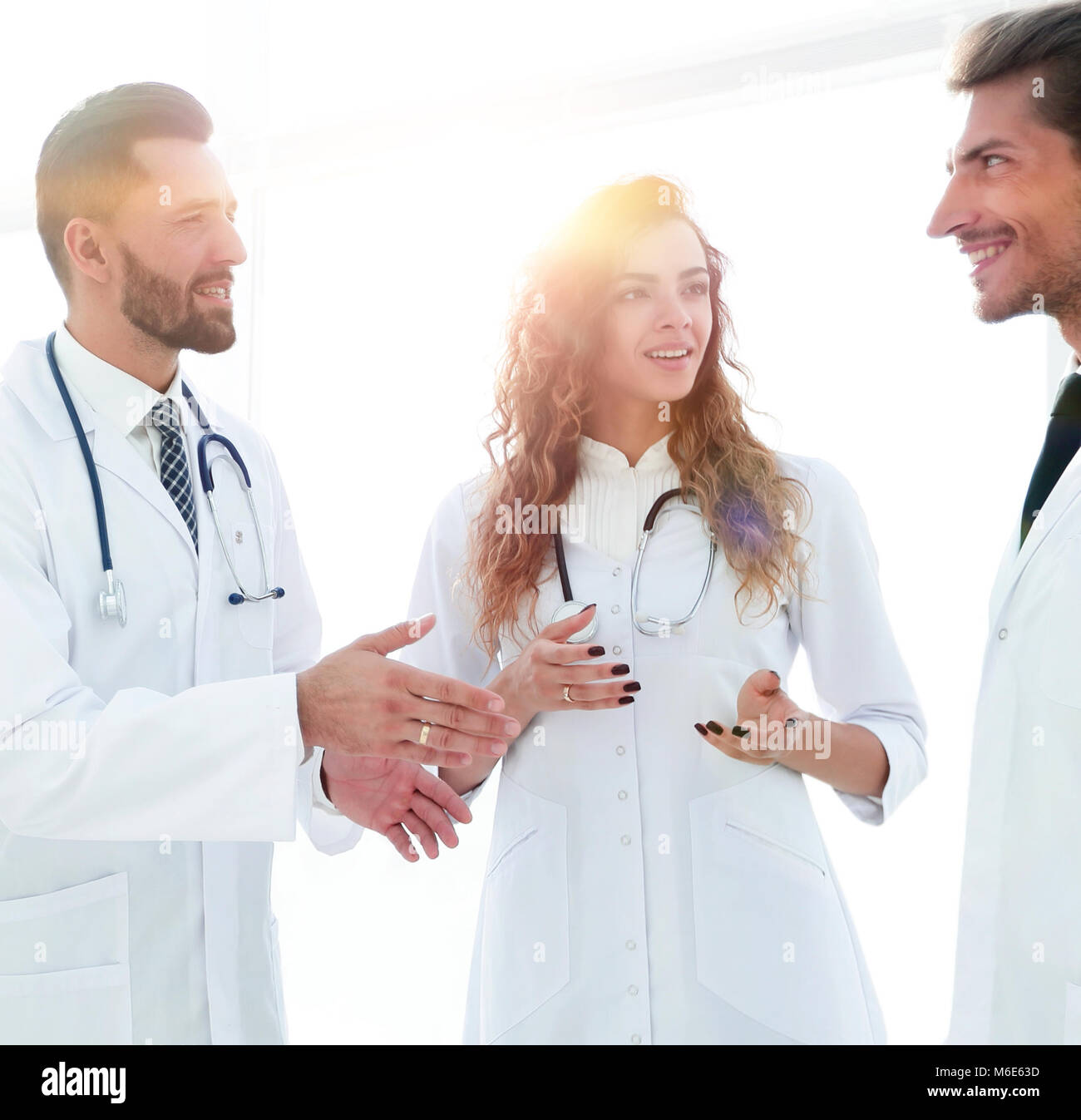 closeup of a group of doctors discussing Stock Photo - Alamy