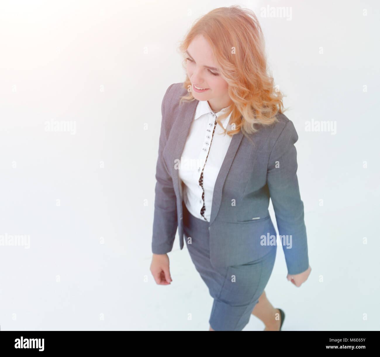 young business woman walking forward Stock Photo - Alamy