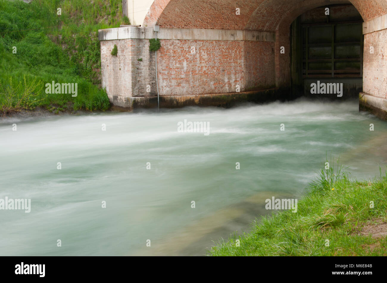 river dam with wooden gate Stock Photo - Alamy