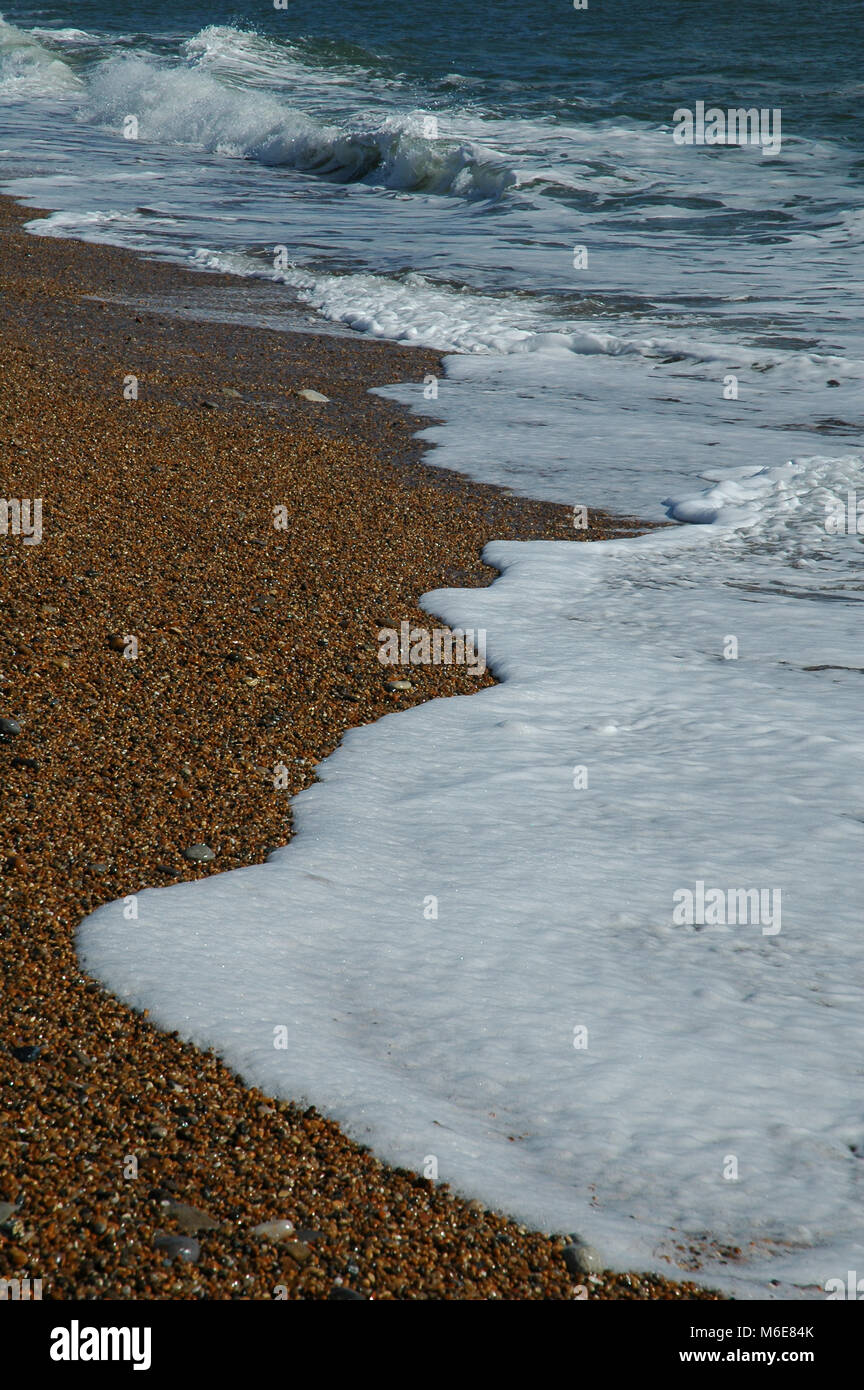 Waves on a Chesil Beach, Dorset Stock Photo - Alamy