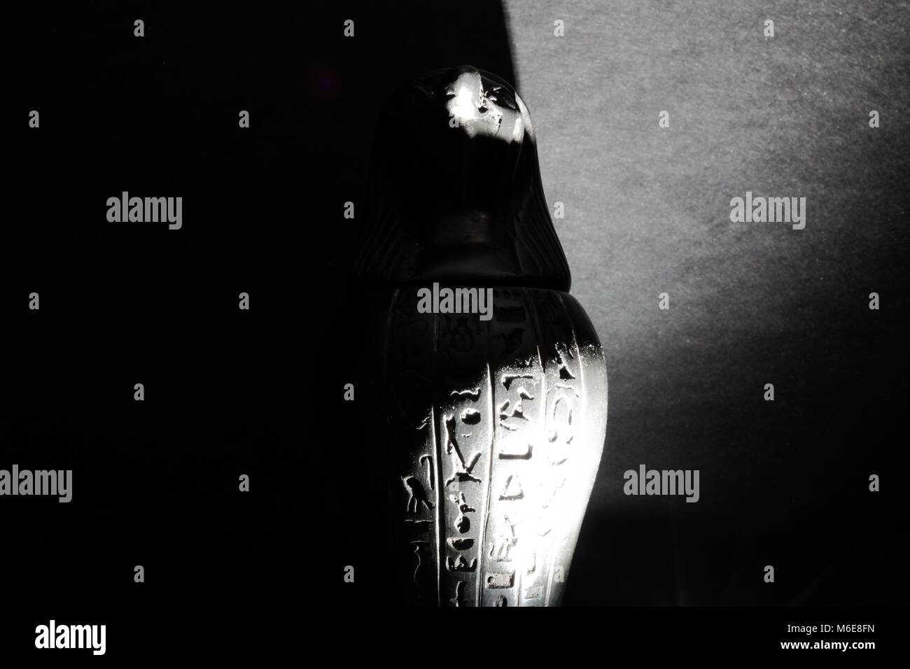 Enlightened, dusty and mysterious statue of Egypt god Horus with Falcon ...