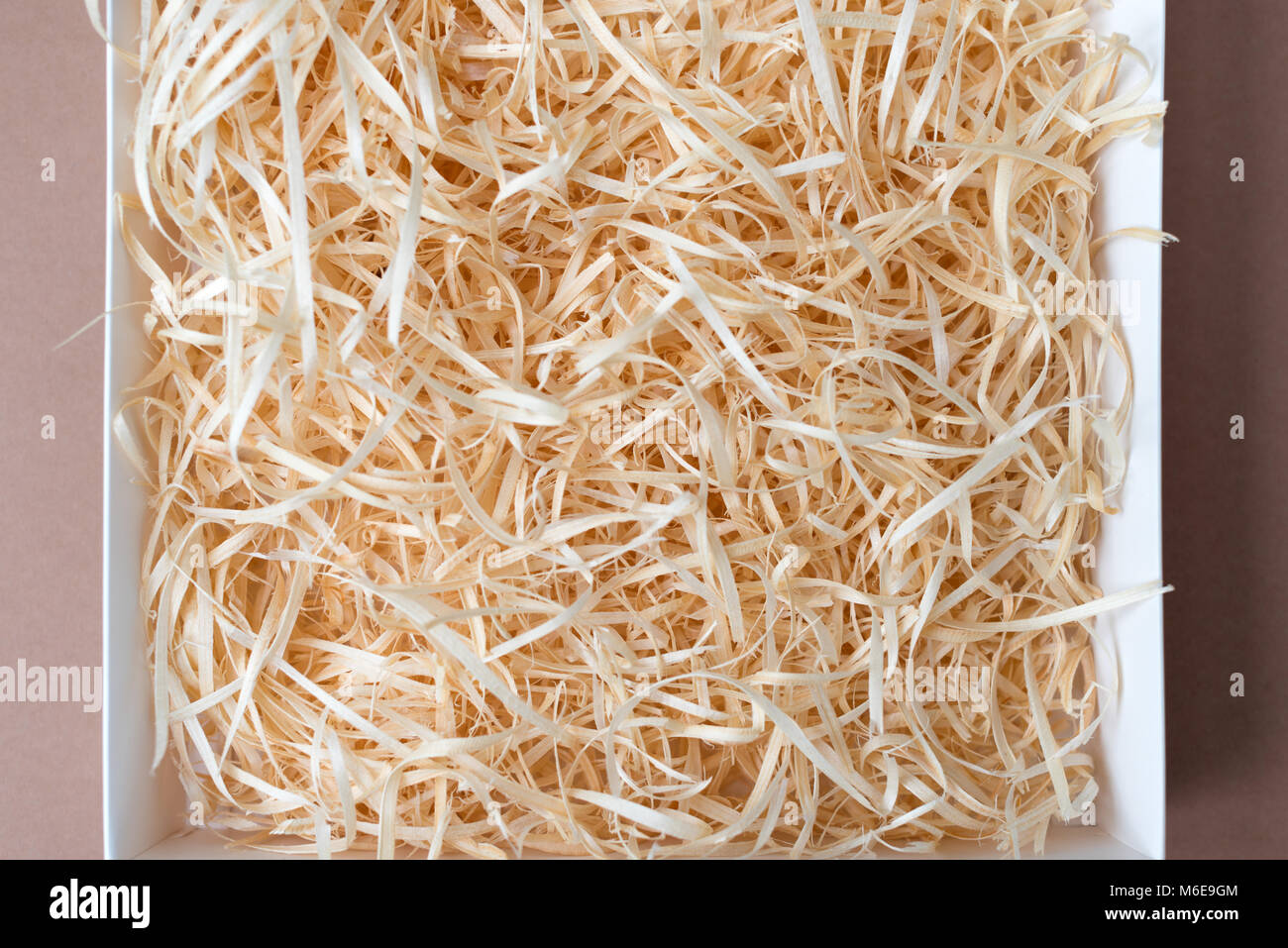 Opened gift box with decorative straw, filler, shavings Stock Photo - Alamy