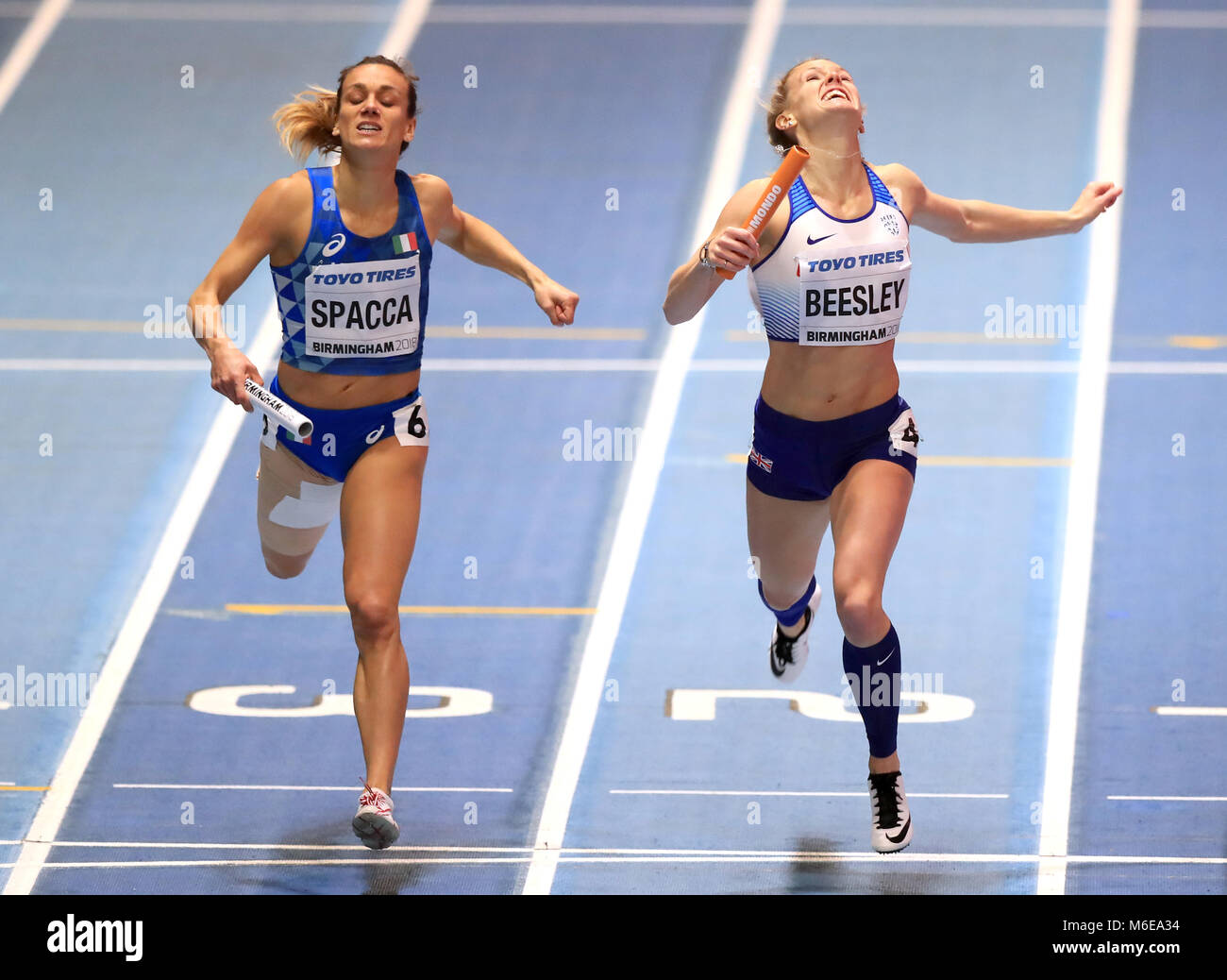 Great Britain's Meghan Beesley (left) stretches for the line during day ...