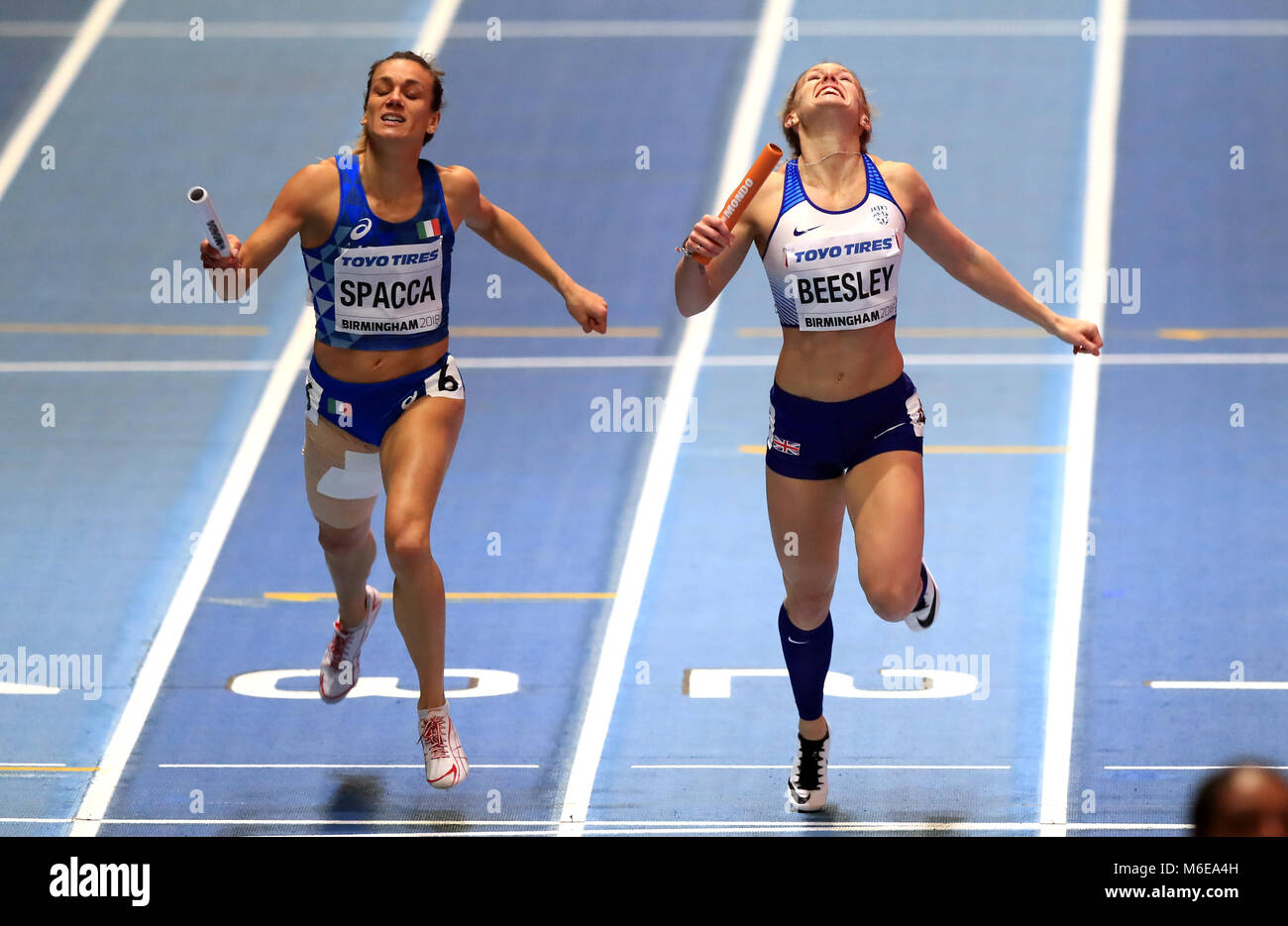 Great Britain's Meghan Beesley (left) stretches for the line during day ...