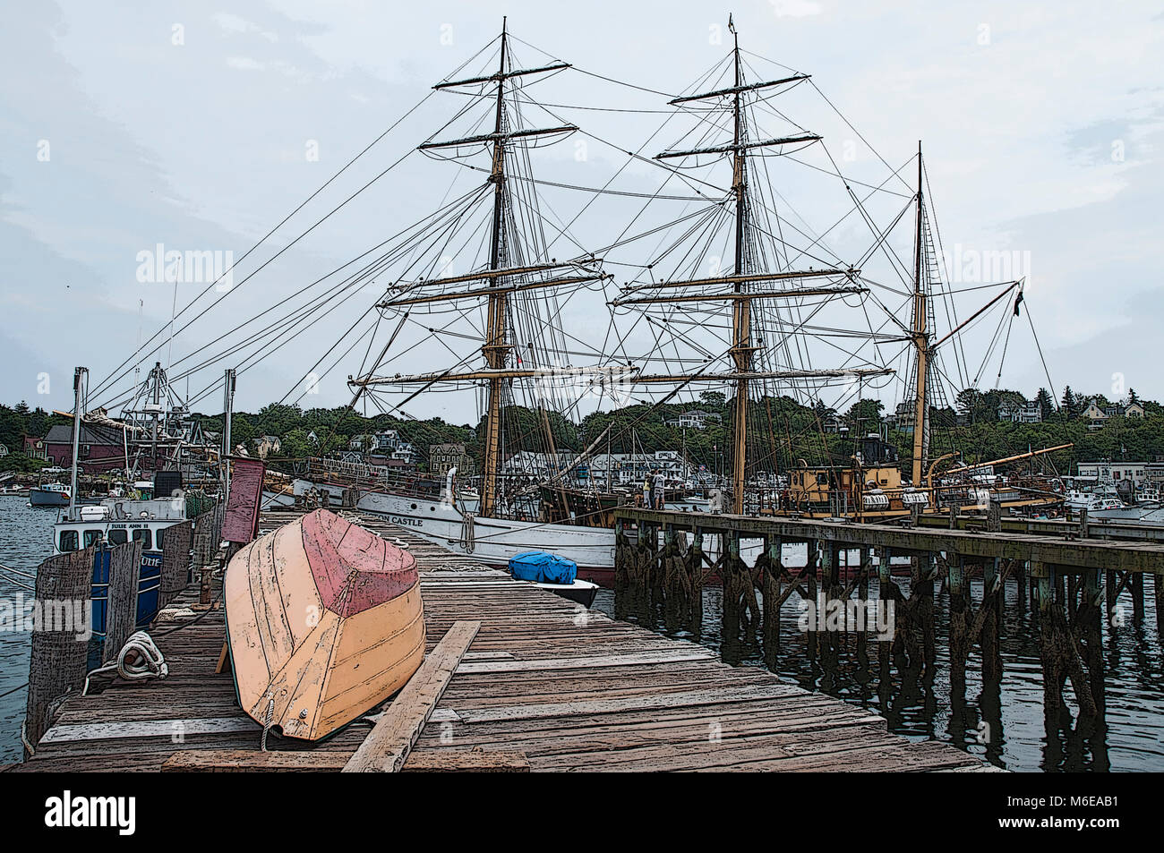 This working dock shows a variety of boats and ships of all ages Stock ...