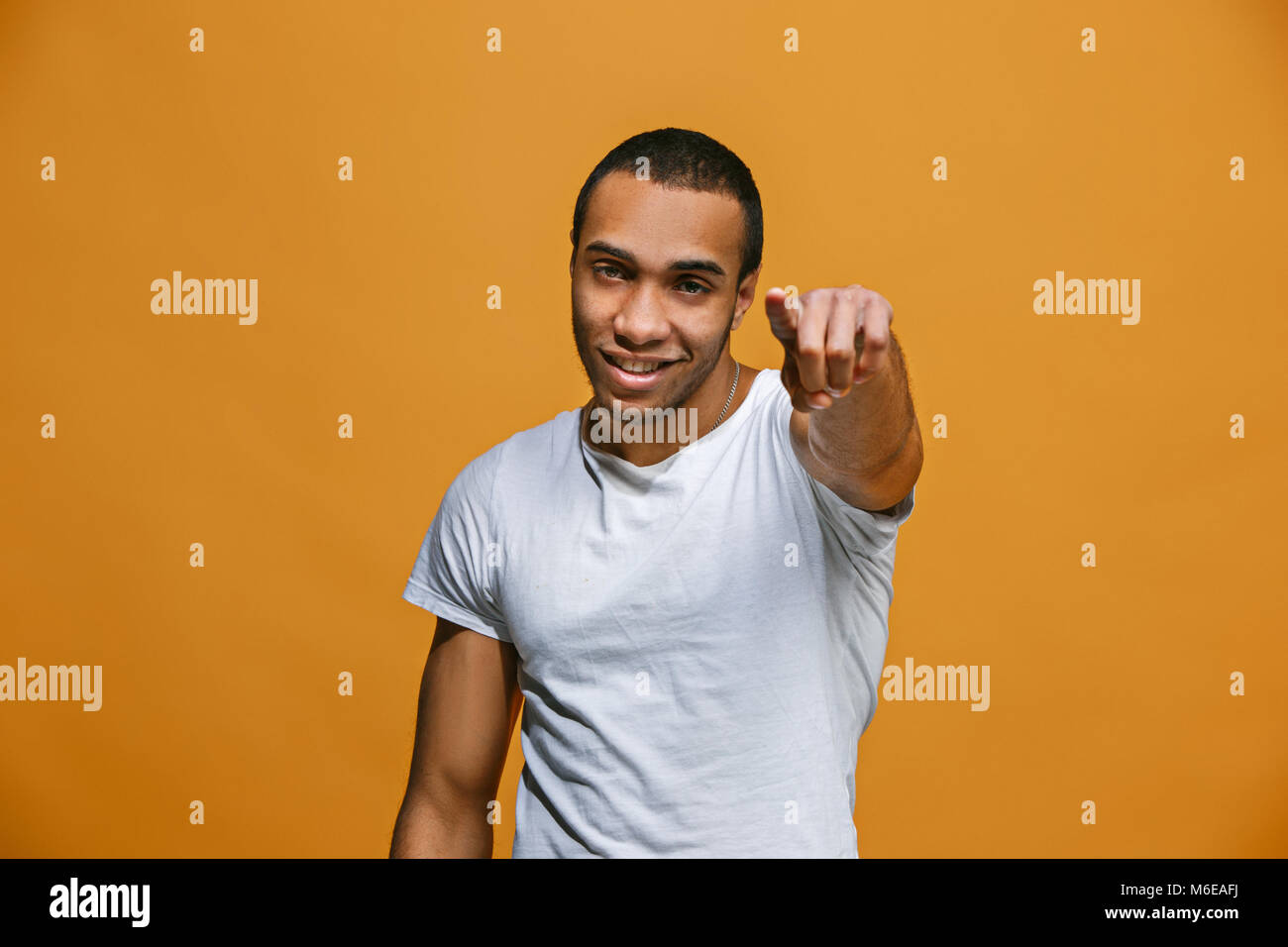 The happy business man point you and want you, half length closeup ...