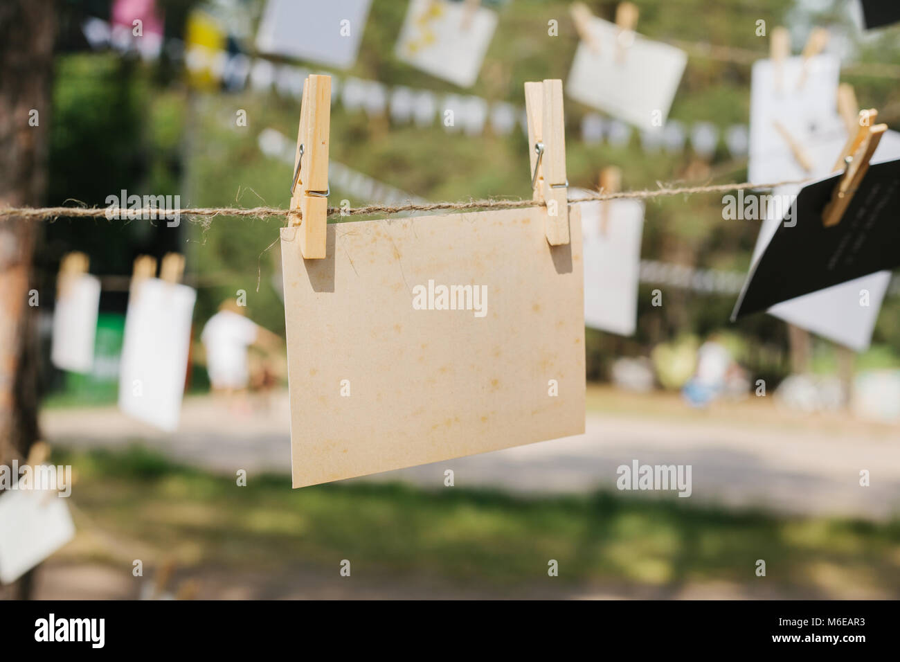 Cards hang on a rope. Memory message. The festival outdoors Stock Photo ...
