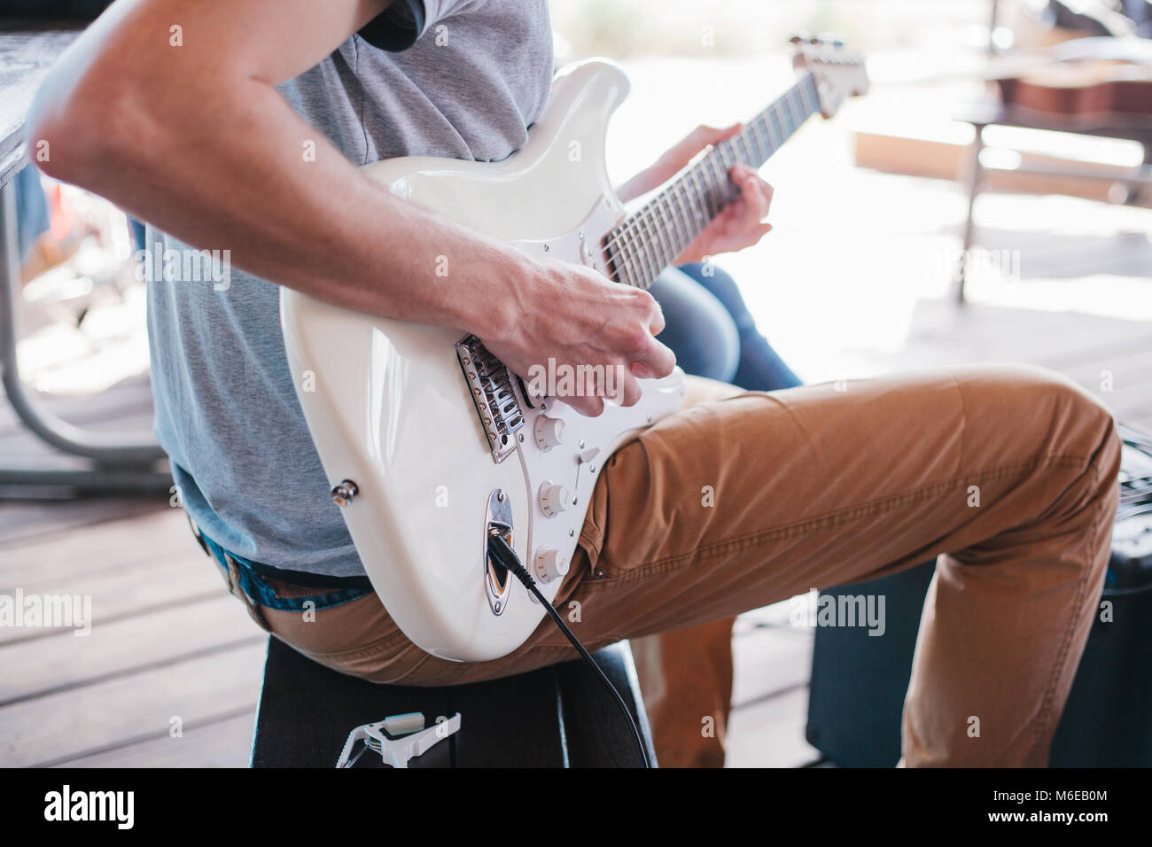 Man playing electric guitar. Music Stock Photo - Alamy