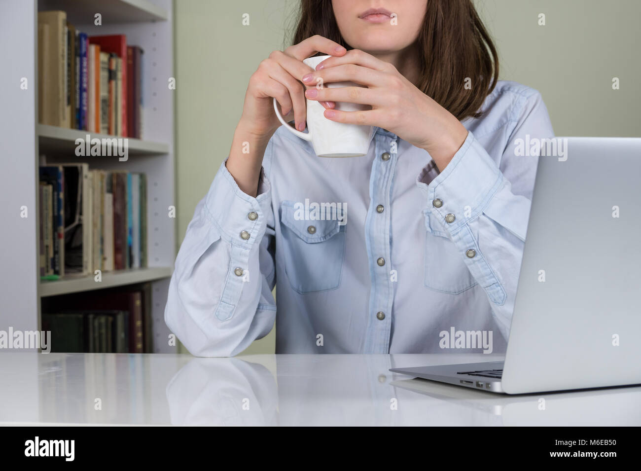 Having a break from work at computer at home Stock Photo - Alamy