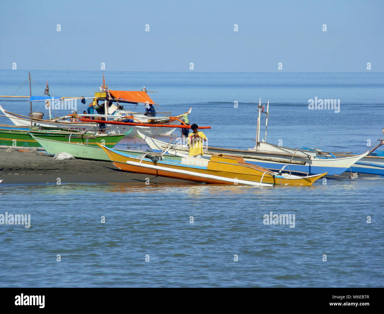 Bangkas, a traditional type of outrigger boats used by Filipino ...