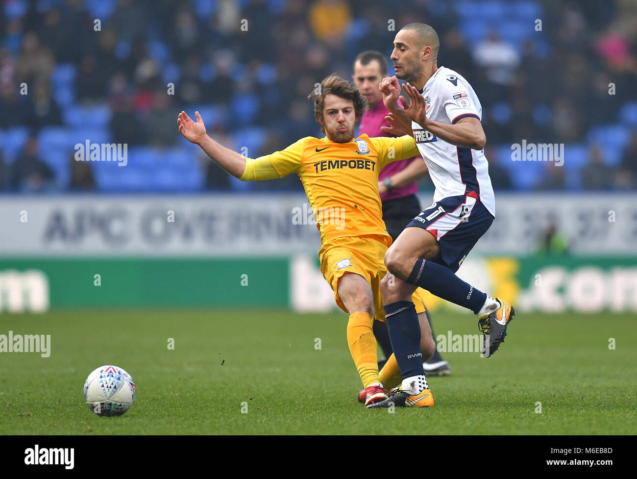 Bolton Wanderers' Darren Pratley is fouled by Preston North End's Ben ...