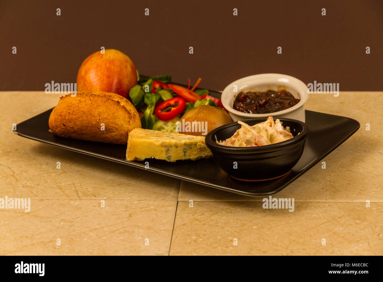 Ploughman’s lunch with stilton cheese, pickle, pickled onion, salad ...
