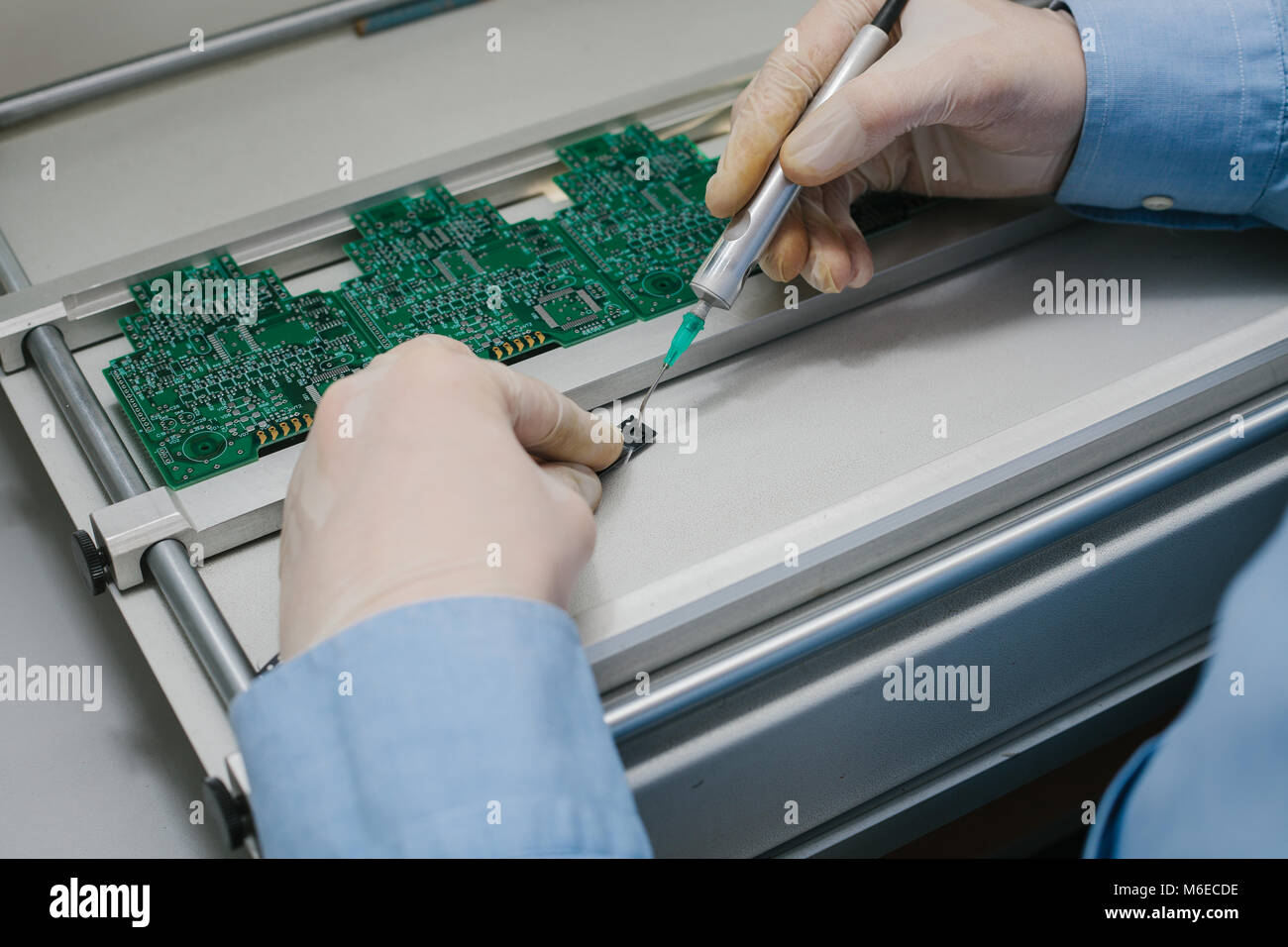 The assembly of computer units. Technological process Stock Photo - Alamy