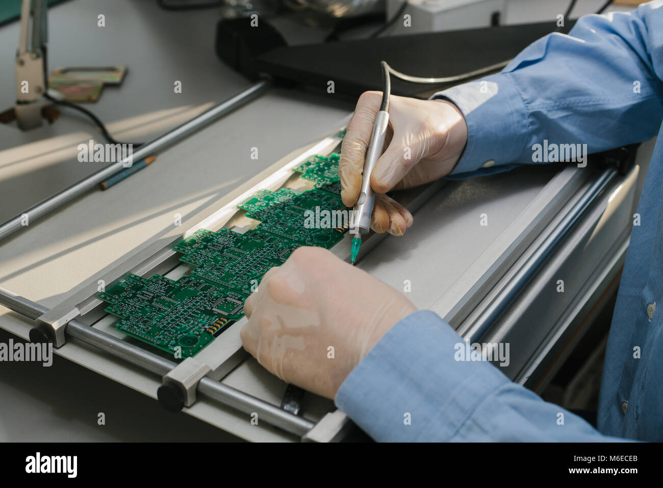 The assembly of computer units. Technological process Stock Photo - Alamy