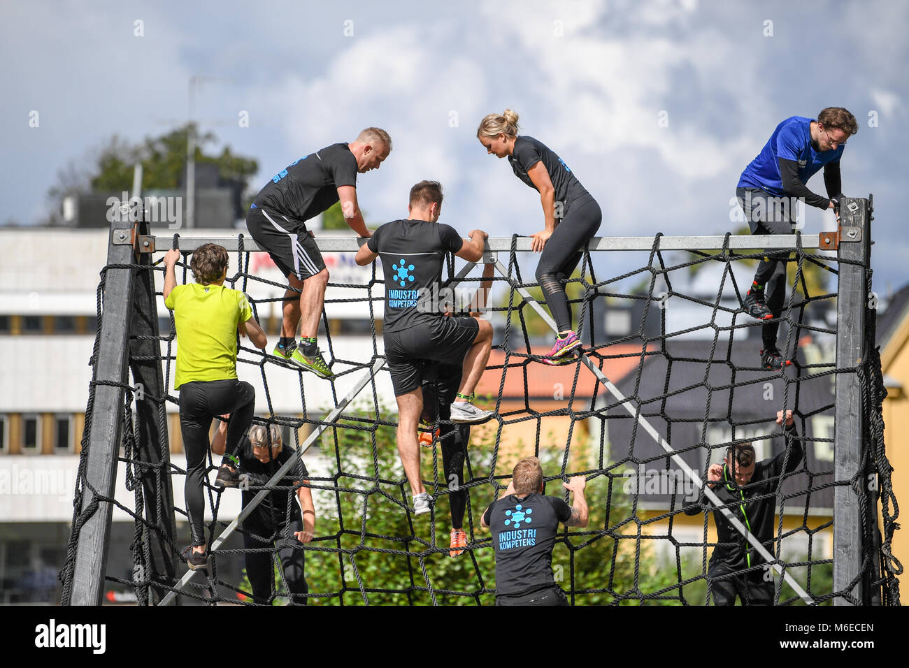 Climbing obstacles at Action run 2017 obstacle race run in the city of ...