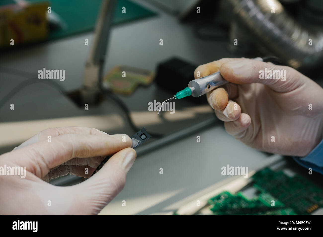 The assembly of computer units. Technological process Stock Photo - Alamy