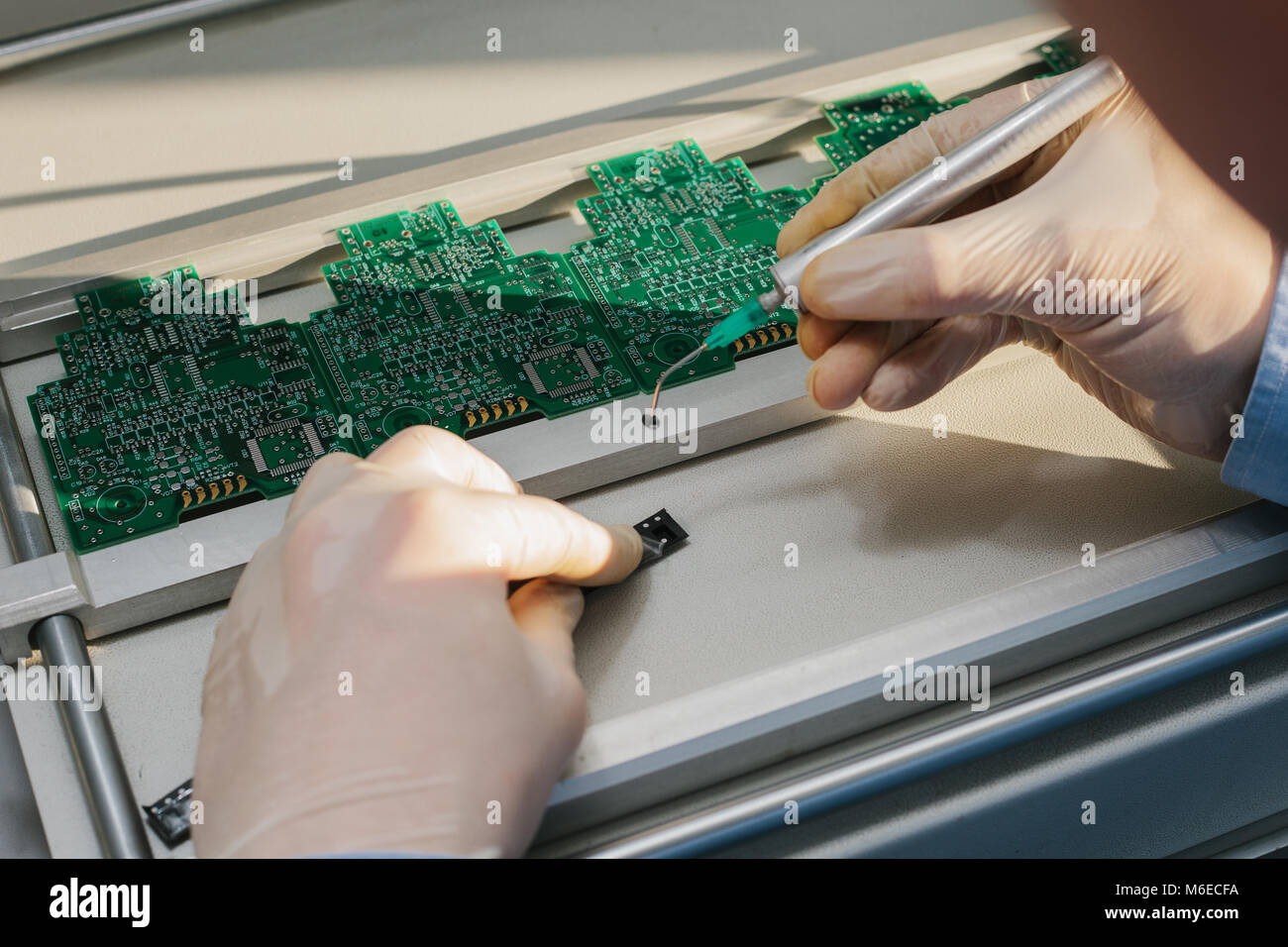 The assembly of computer units. Technological process Stock Photo - Alamy