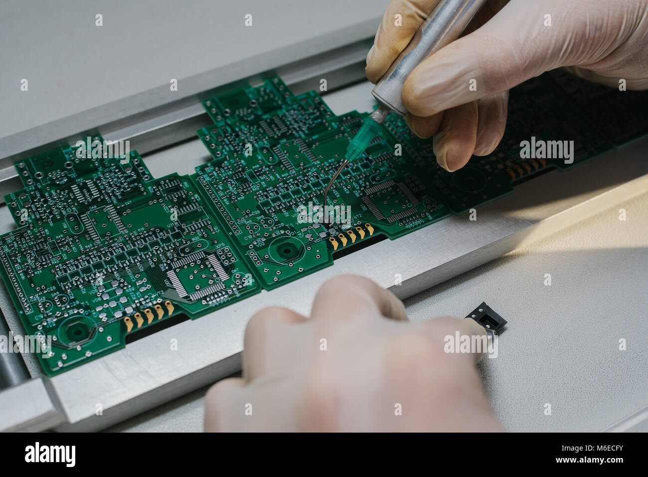 The assembly of computer units. Technological process Stock Photo - Alamy