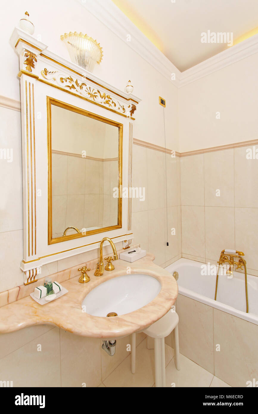 Vintage rococo style bathroom interior with marble sink Stock Photo - Alamy