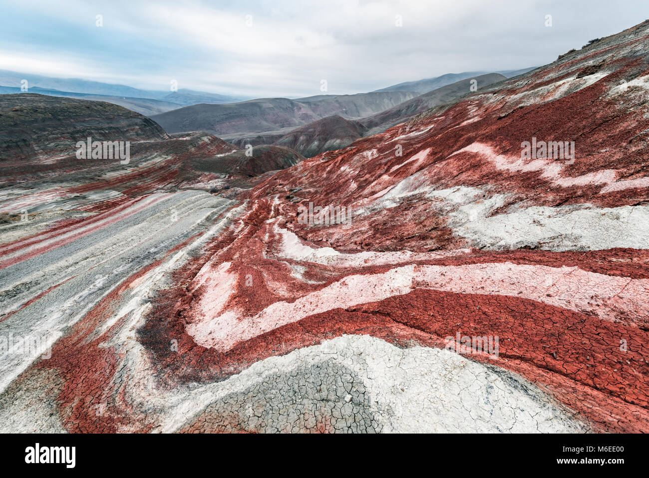 Amazing striped red mountain slope Stock Photo - Alamy
