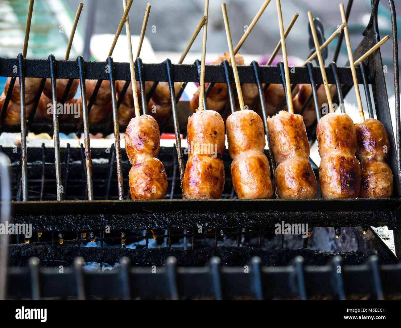 Thai sausage (Sai Krok Isan), made from mince pork, rice. Mix all ...