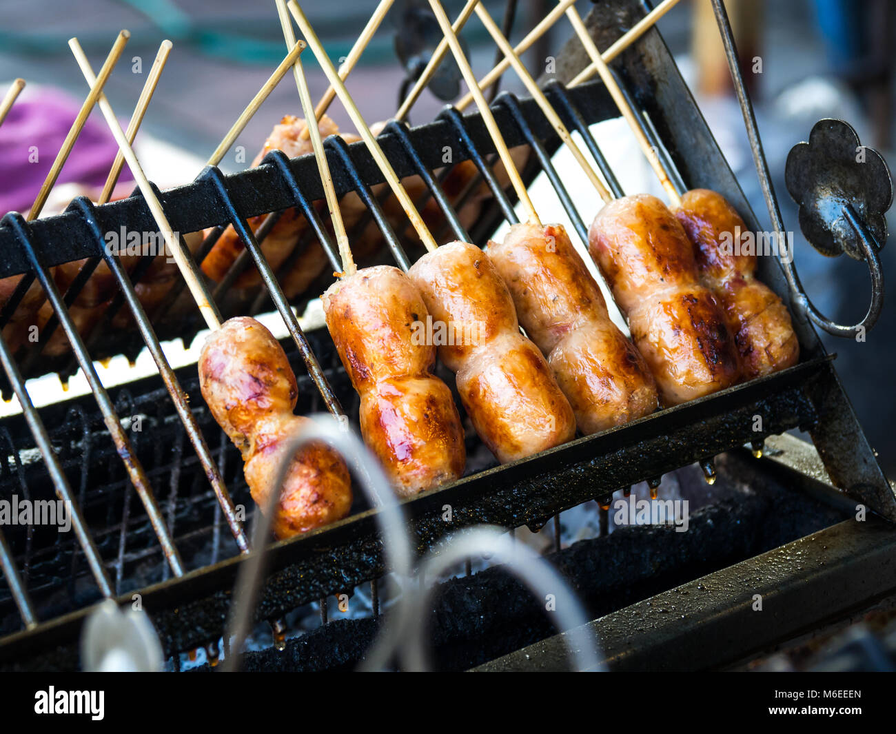 Thai sausage (Sai Krok Isan), made from mince pork, rice. Mix all ...