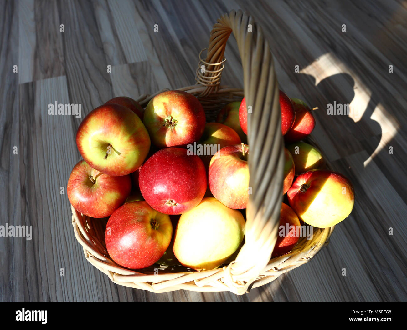 Fresh apples in a basket Stock Photo - Alamy