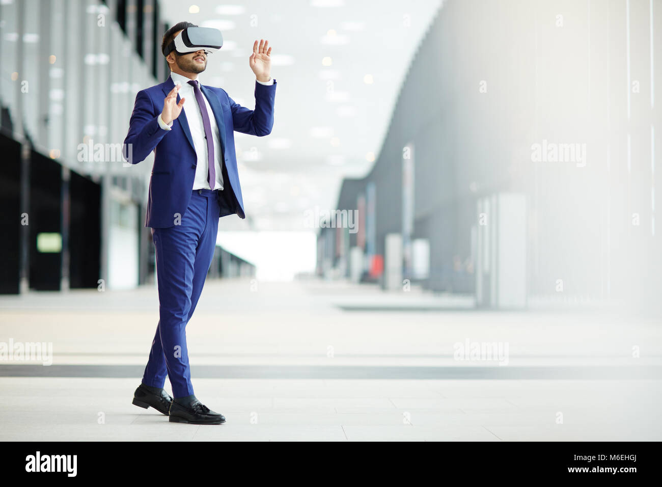 Person with headset walking hi-res stock photography and images - Alamy