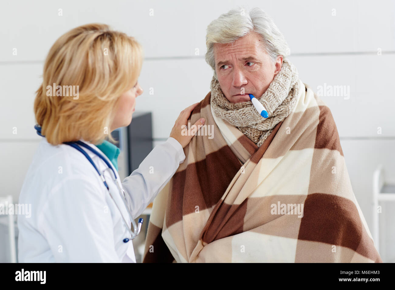 Visit to the doctor Stock Photo - Alamy