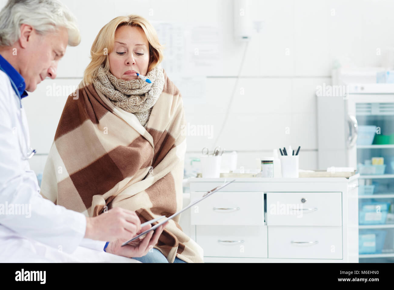 Take temperature hi-res stock photography and images - Alamy