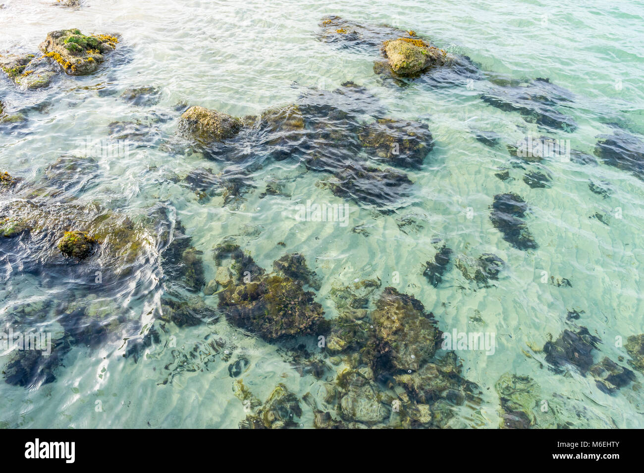 Rocks by the sea with waves of the Mediterranean sea next to the Cabo ...