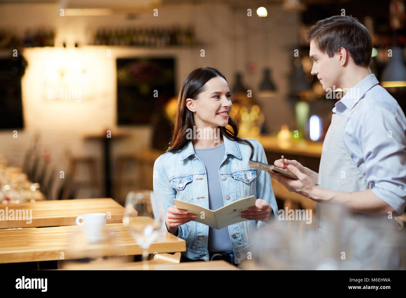 Man taking an order Stock Photo - Alamy