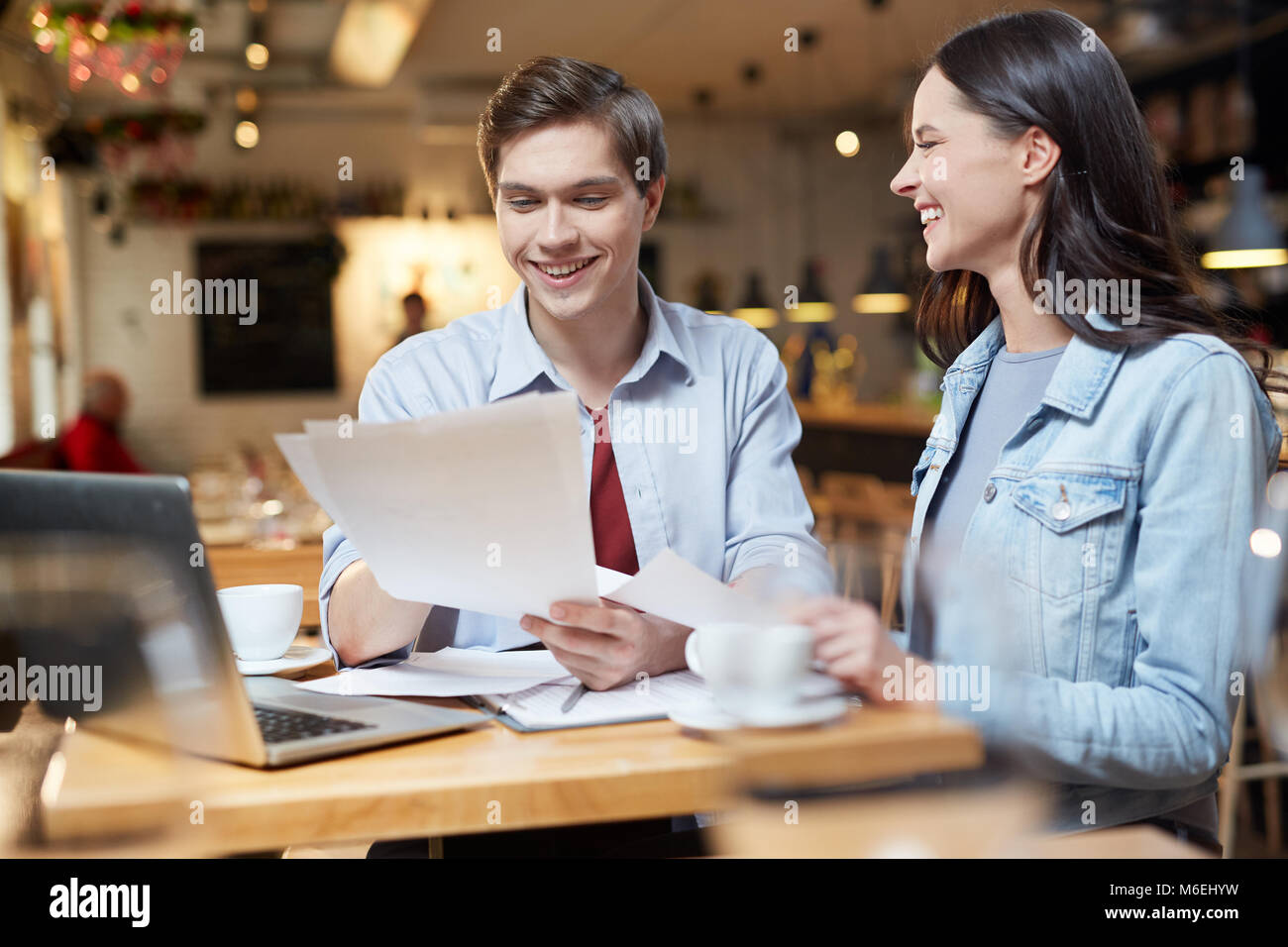 Working at cafe Stock Photo - Alamy