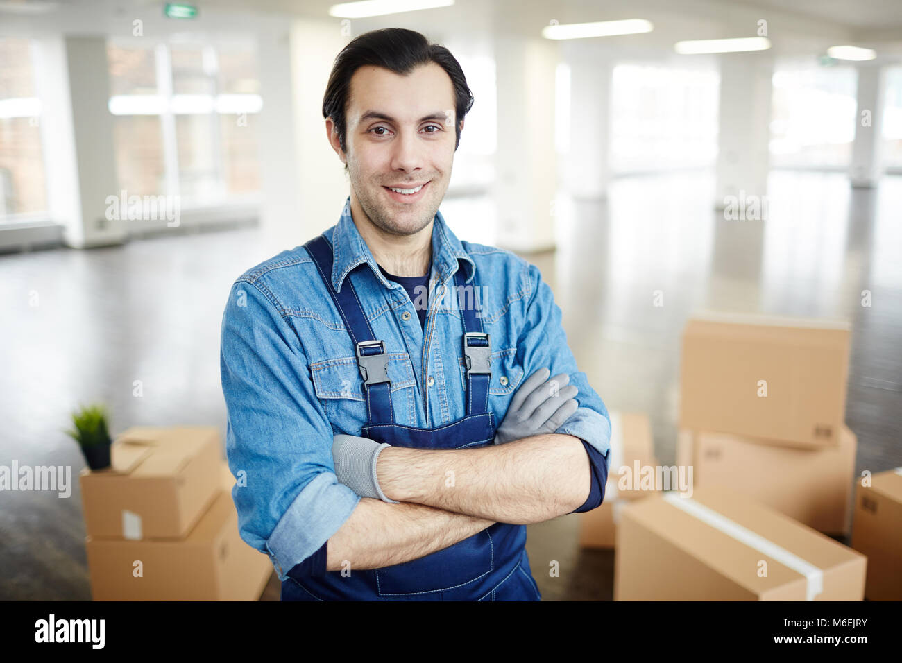 Young load worker Stock Photo - Alamy