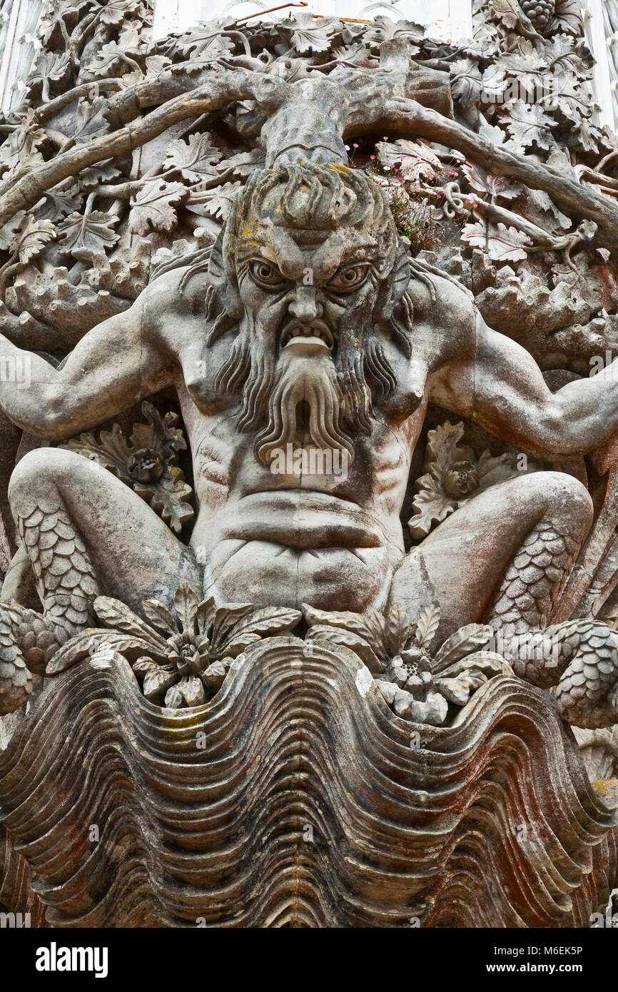 Detailed design and sculpture of a Newt (mythical creature) above the ...