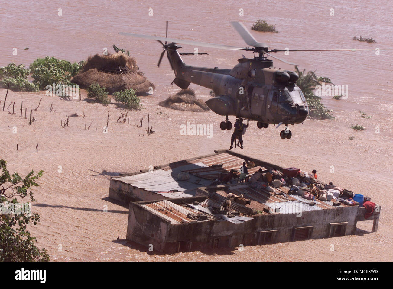 Floods in Mozambique, March 2000; A South African Air Force helicopter ...