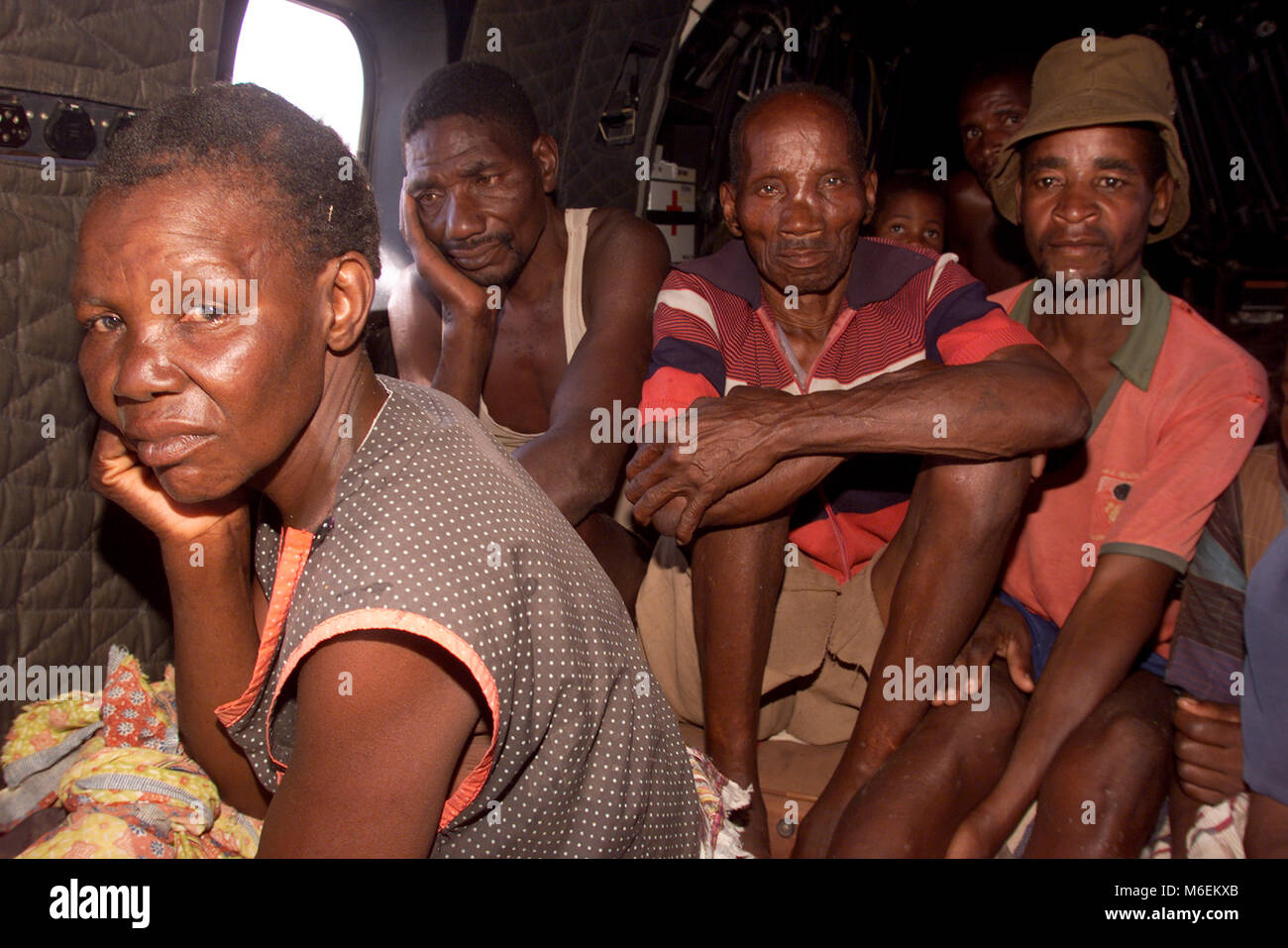 Floods in Mozambique, March 2000; A South African helicopter plucks ...