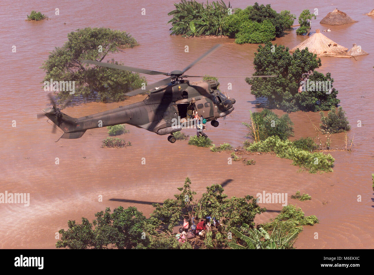 Floods in Mozambique, March 2000; A South African Air Force helicopter ...